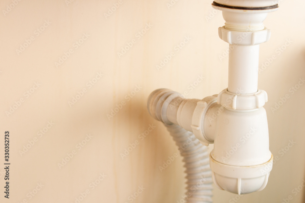 siphon plastic bent curved pipe under the sink. Elbow Stock Photo ...