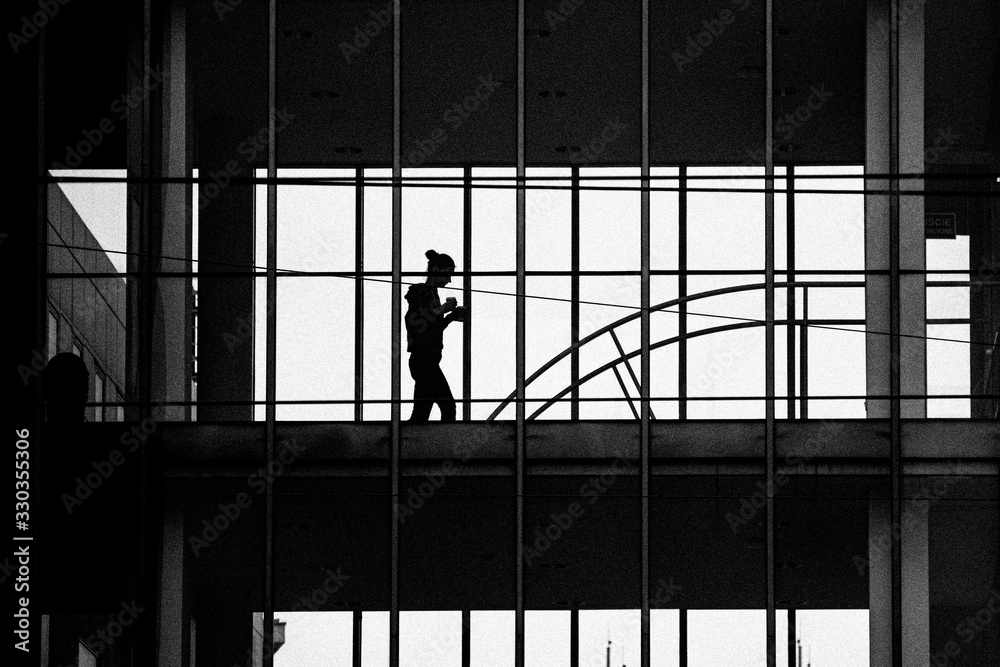 Women silhouette in window of office skyscraper Stock Photo | Adobe Stock