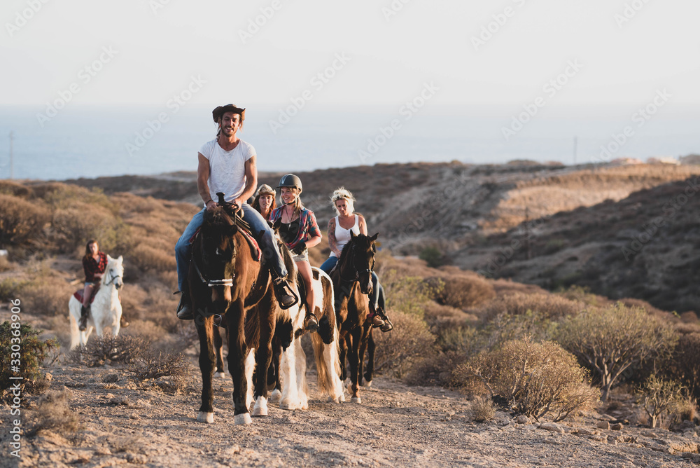 group of people riding on a horse together walking and discovering new ...