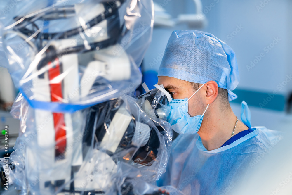 Surgical room in hospital with robotic technology equipment, machine ...