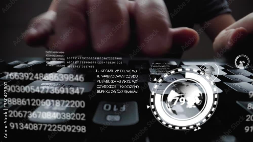 Time lapse of man working on laptop computer keyboard with graphic user ...