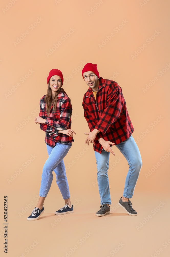Happy couple dancing against color background Stock Photo | Adobe Stock