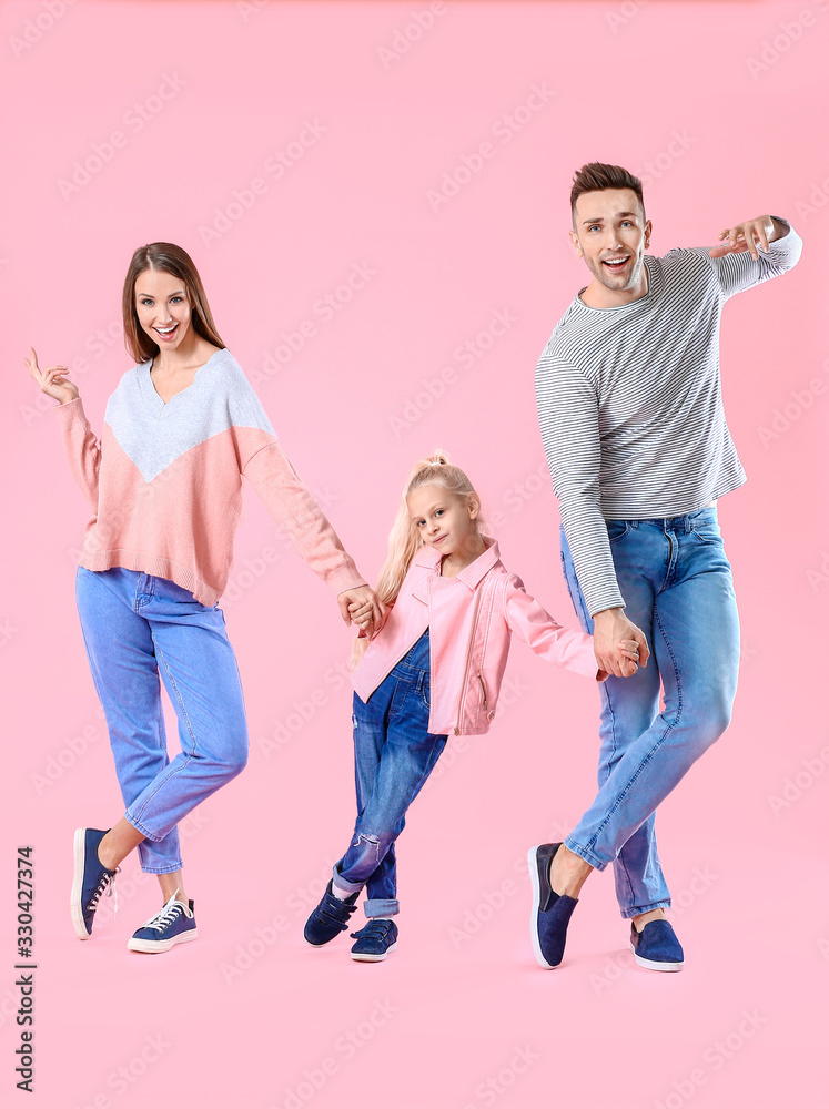 Happy family dancing against color background Stock Photo | Adobe Stock