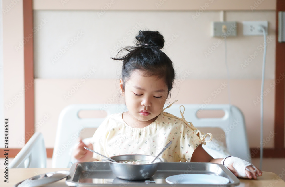 Asian child patient or kid girl Influenza A sick and sad with cry to ...