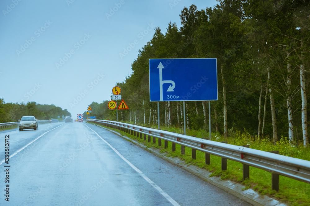 blank blue billboard with detour arrow directions and warning road ...