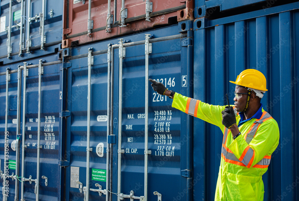 Warehouse shipping transportation concept. Commercial docks worker and ...