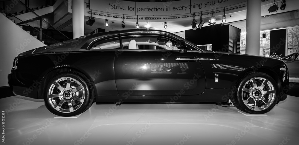 BERLIN - MARCH 08, 2015: Showroom. Full-size car Rolls-Royce Wraith ...