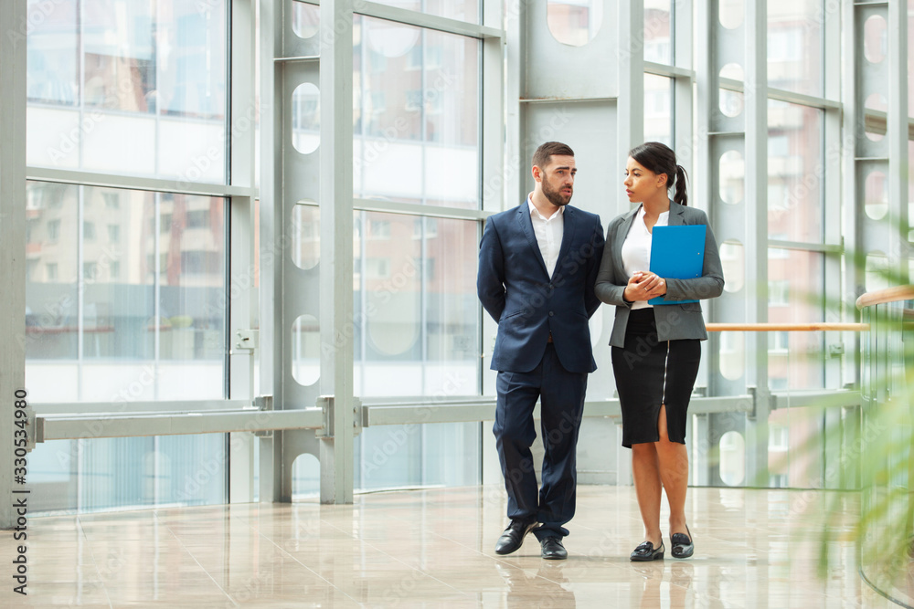 Business people walk together Stock Photo | Adobe Stock