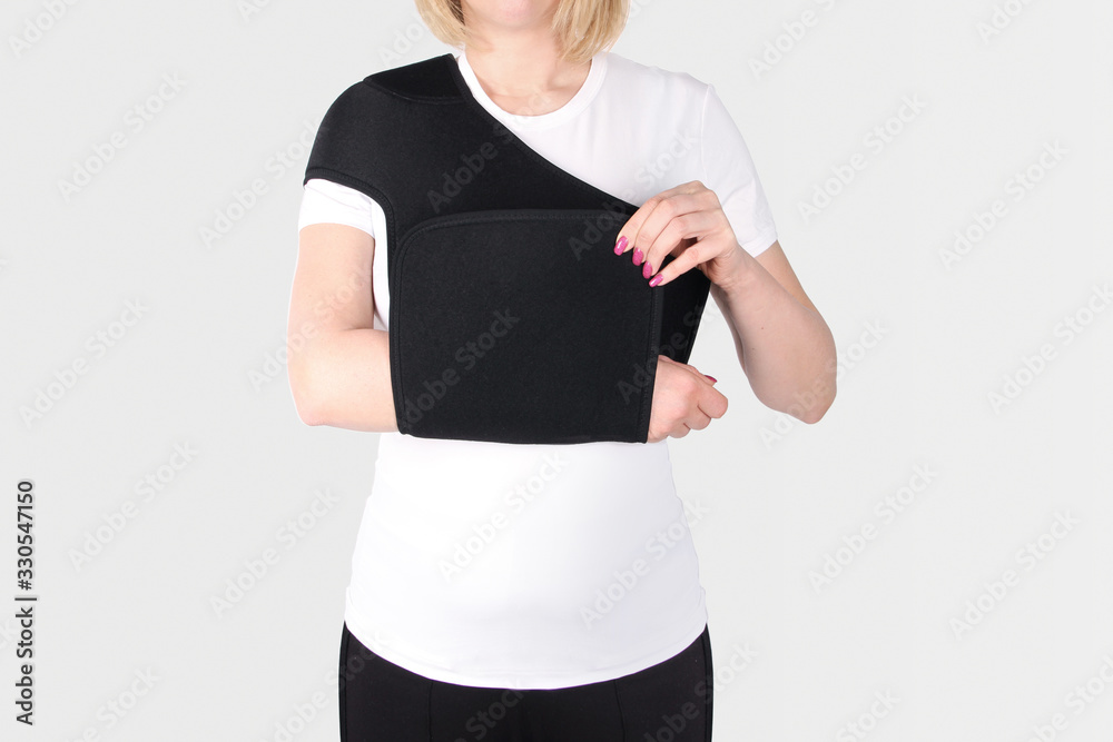 Shoulder Joint Brace. Bandage on the shoulder joint (scarf) with ...