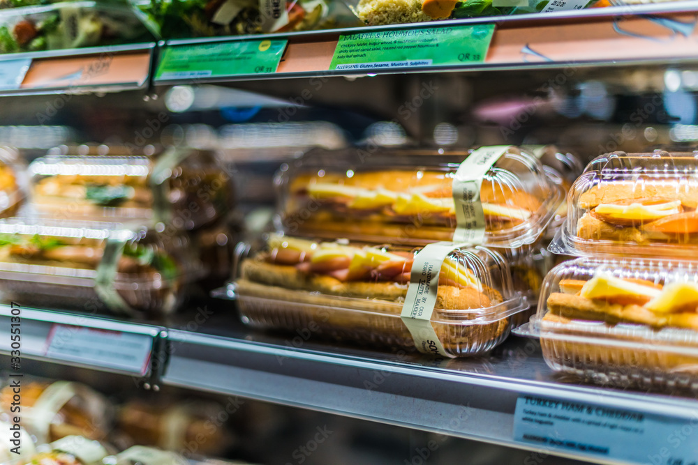 Pre-packaged foods displayed in a commercial refrigerator Stock Photo ...