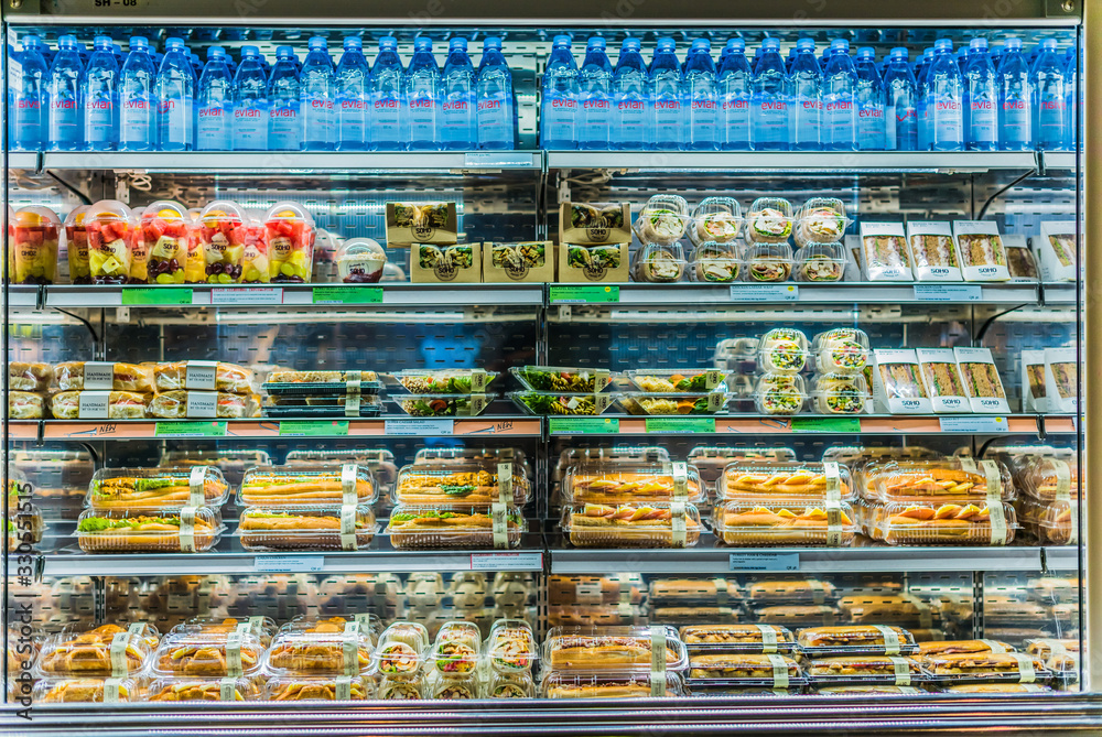 Pre-packaged foods displayed in a commercial refrigerator Stock Photo ...