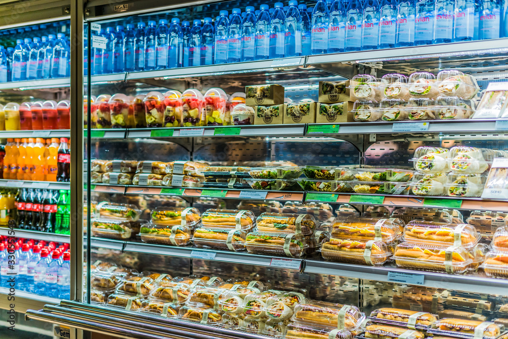 Pre-packaged foods displayed in a commercial refrigerator Stock Photo ...