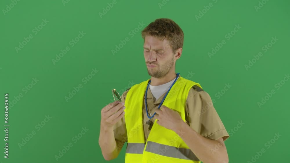 Adult Man Police Officer Cleaning His Dark Sunglasses With Care Studio ...
