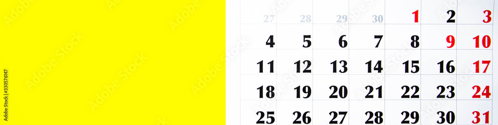 Macro calendar from different angles on a yellow and pink background ...