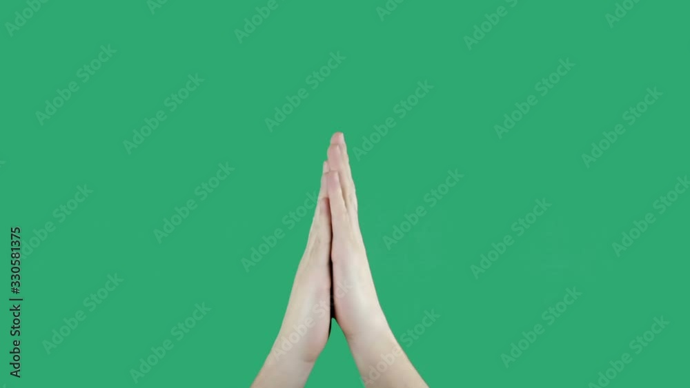 Male hands clapping hands softly. Arms isolated on green chromakey ...