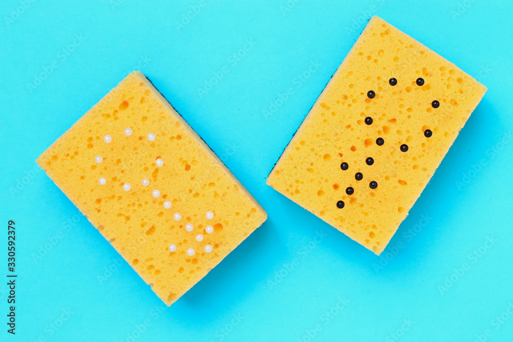 Abstract signs of man and woman made by needles in sponges for washing ...