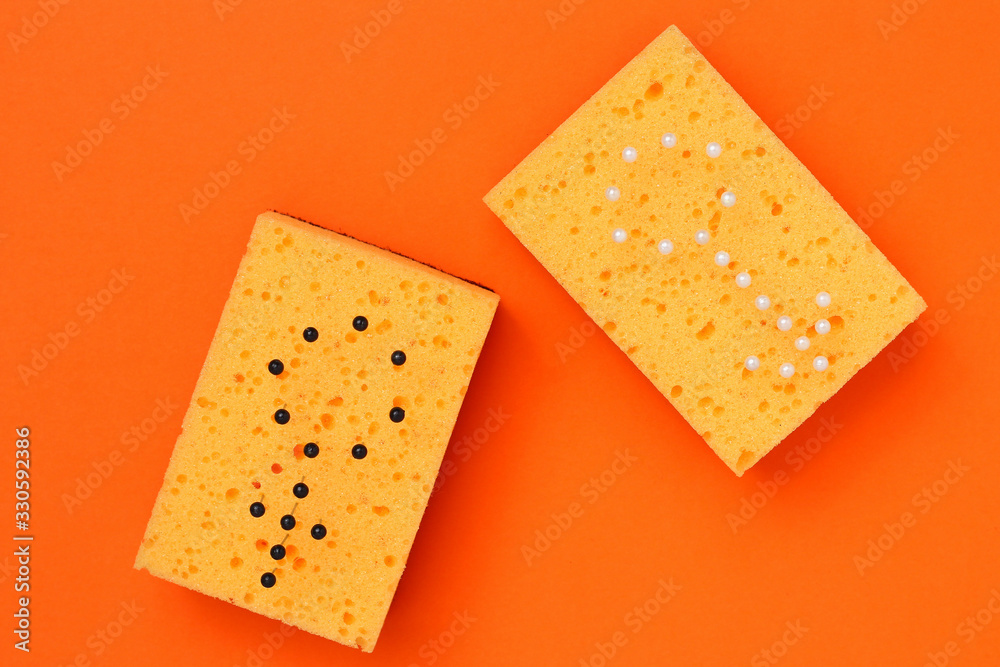 Abstract signs of man and woman made by needles in sponges for washing ...
