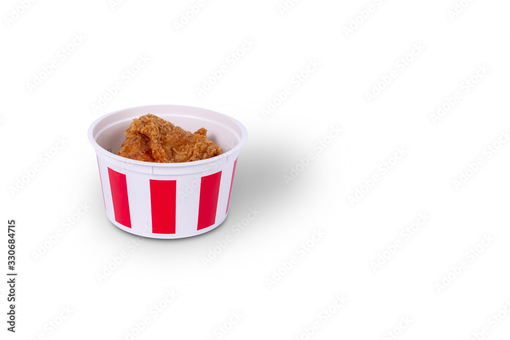 Rice with crispy fried chicken in bucket isolated on white background ...