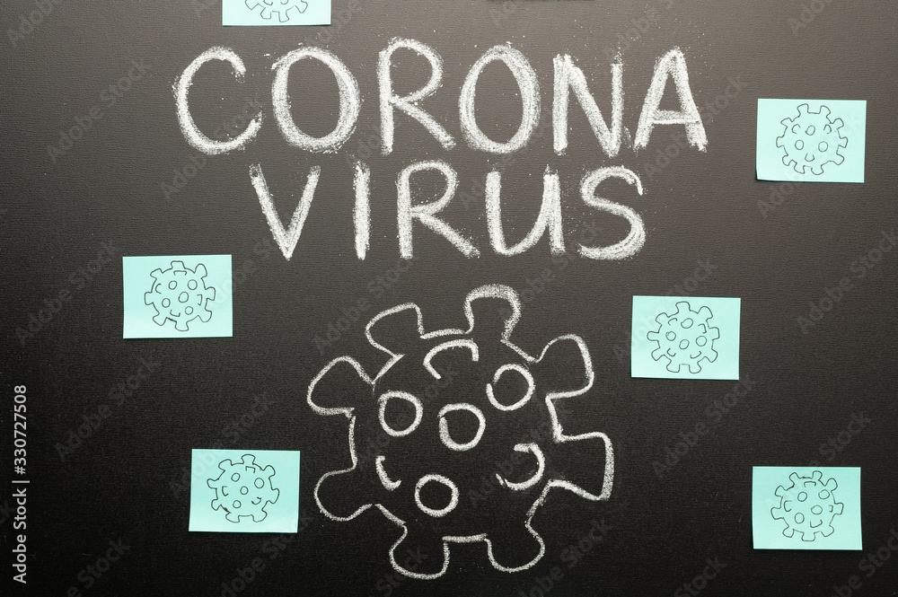 2019-ncov coronavirus, a blackboard and a drawing of a dangerous virus, and many stickers ...