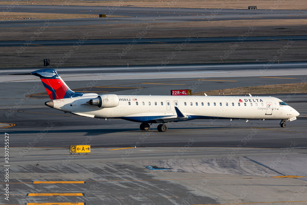 Delta Air Lines Bombardier CRJ-900 airplane at New York JFK Stock Photo ...