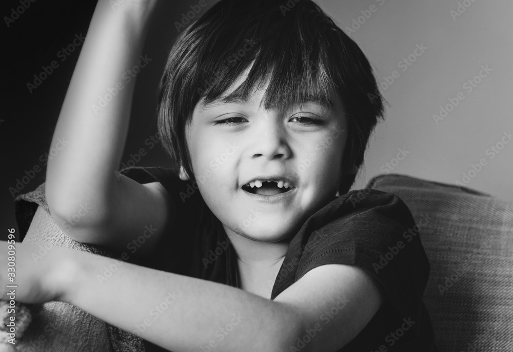Cropped short kid looking at camera with smiling face,Candid short ...