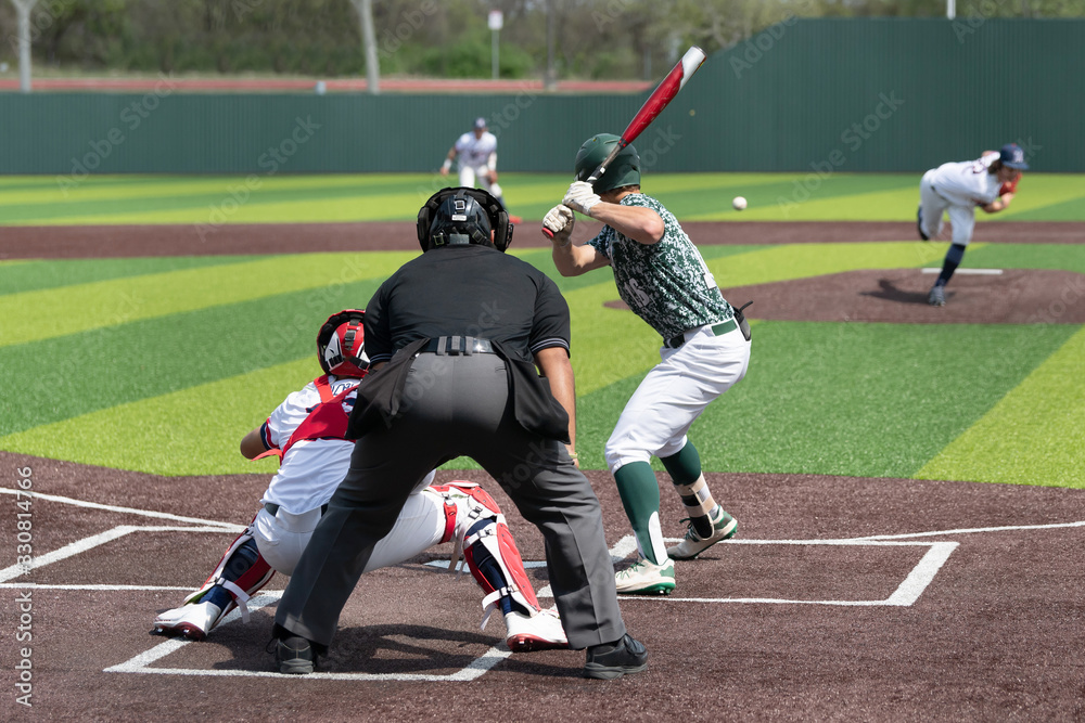 Young boy swinging the bat for a hit in a baseball game Stock Photo ...