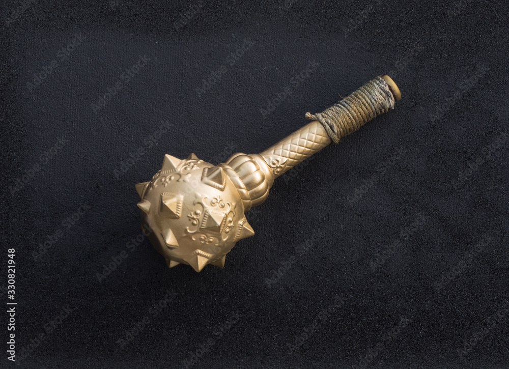 ancient weapon golden mace on a black background Stock Photo | Adobe Stock