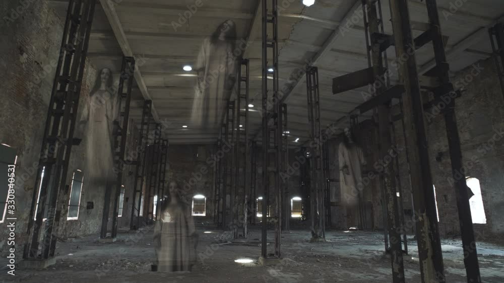 Ten ghosts of women chained by shackles fly in a gloomy hall of an old ...