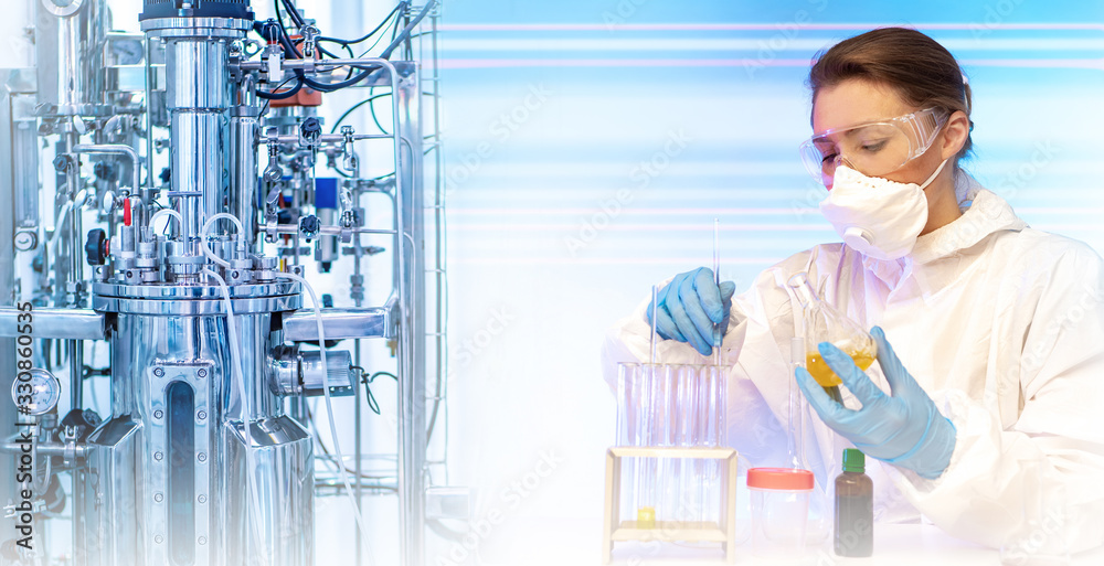 Bioreactor Production of drugs. Lab technician creates medicines ...