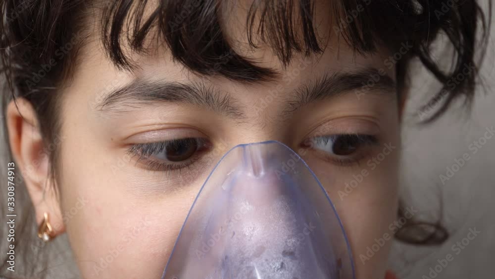 Teenager girl in the room makes inhalation. Home treatment. Viral ...