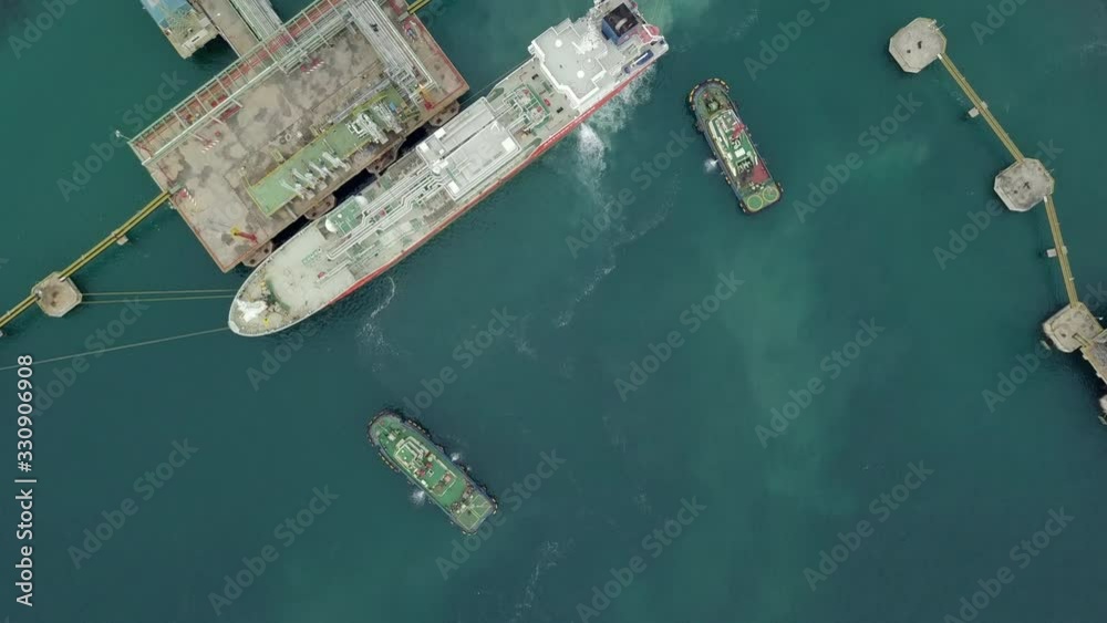 4k, Aerial footage cargo tanker ship vessel at port with marine loading ...