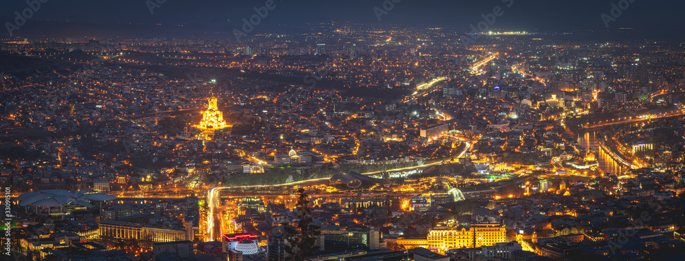 Panorama nightscape view of Tbilisi from mtatsminda pantheon view point ...
