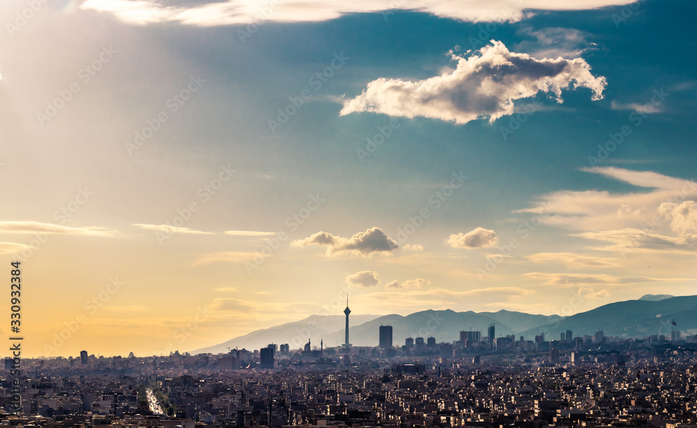 Tehran skyline in a beautiful cloudy day with golden hour light Tehran ...