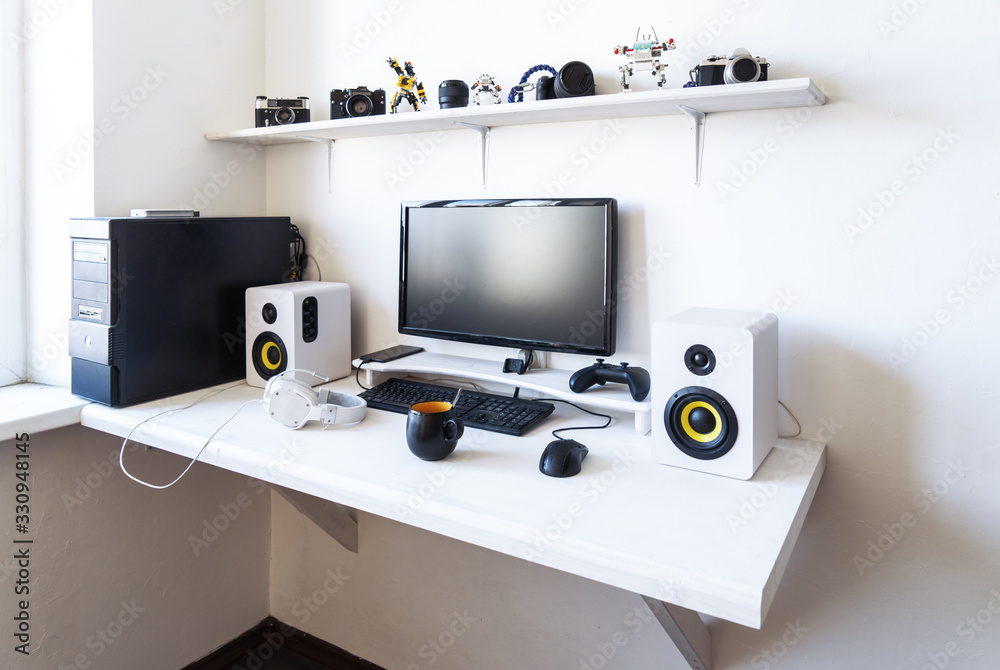 The workplace of a professional gamer with a monitor, gamepad ...