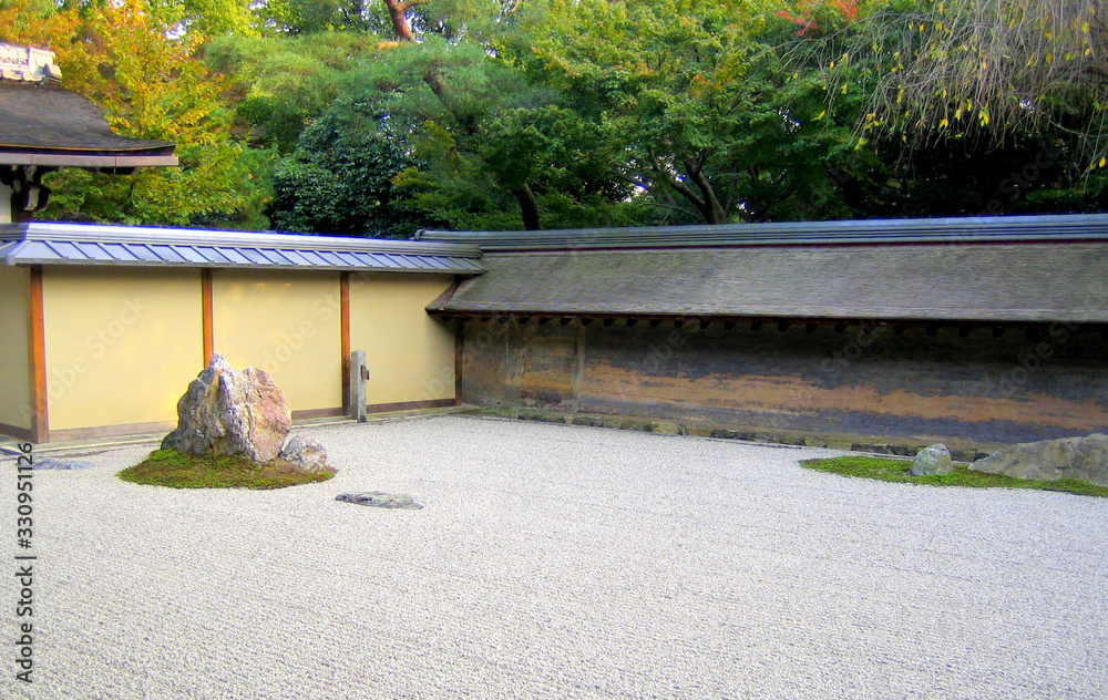 The famous zen garden of Ryoanji temple in Kyoto, Japan. It's one of ...
