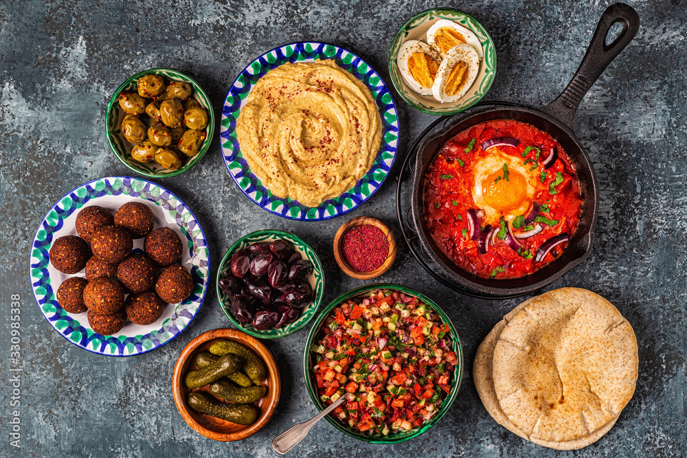 Falafel, hummus, shakshuka, Israeli salad - traditional dishes of ...