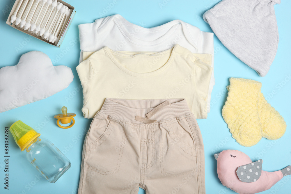 baby clothes on a colored background top view. Baby background 스톡 사진 ...
