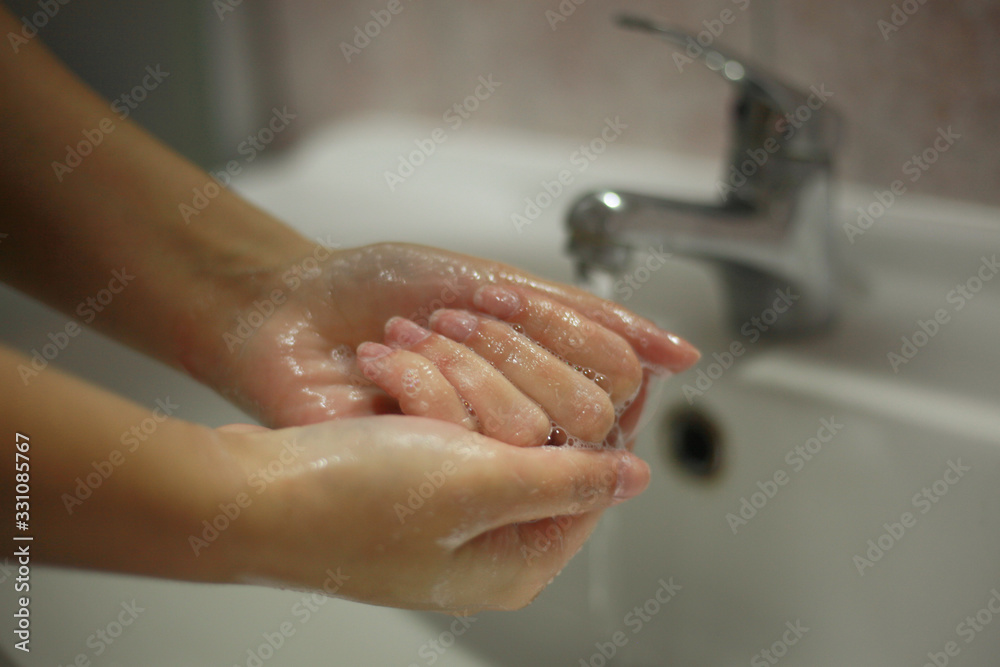 Hand washing with warm water. Prevention of communicable diseases ...