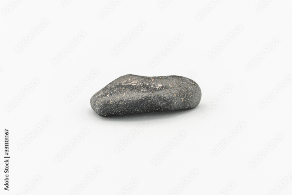 Black magnetic Atacaimite Tektite Meteorite isolated, a rock formed in ...