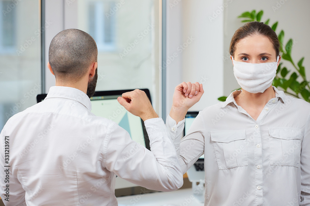 Elbow greeting to avoid the spread of coronavirus (2019-nCoV). Woman ...