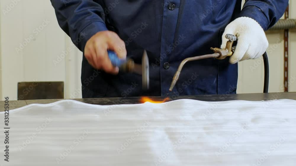 Silver Catalyst Factory Worker Soldering Metal Sheet By Fusing Blow ...