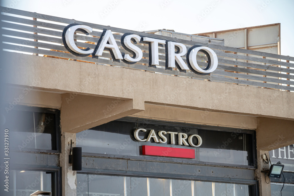 Castro clothing shop logo sign on the wall of the store entrance ...