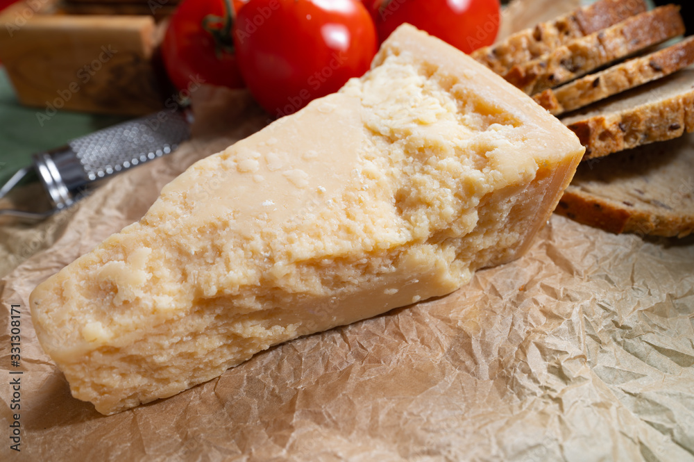 One piece of authentic Parmigiano-Reggiano or Parmesan Italian hard ...