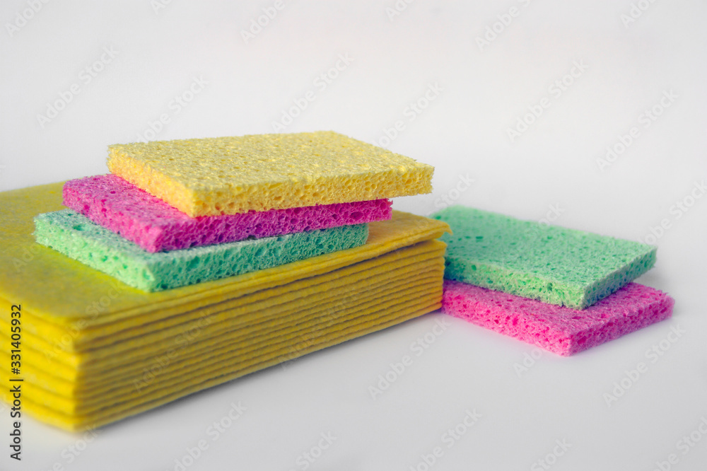 Bright colored sponges for washing dishes, cleaning the bathroom and ...