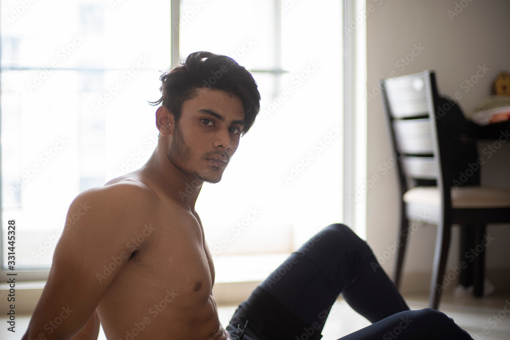 An Young And Handsome Indian Bengali Brunette Man With Muscular Body