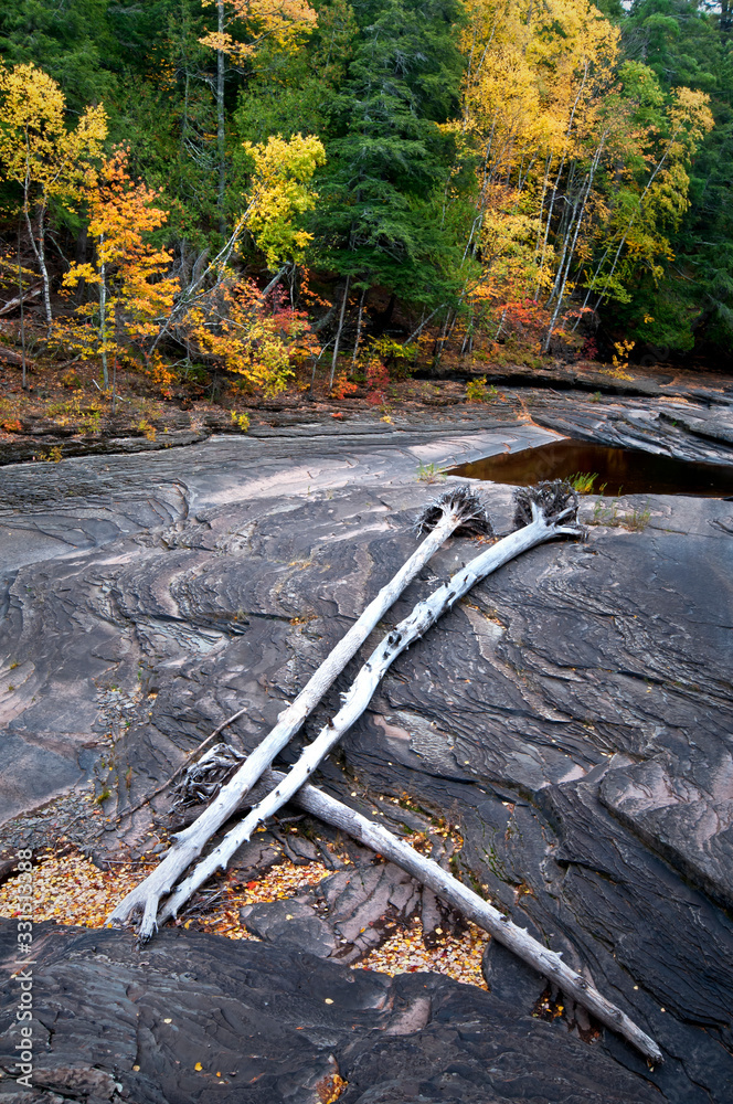 Low water levels on the Presque Isle River where it flow through the ...