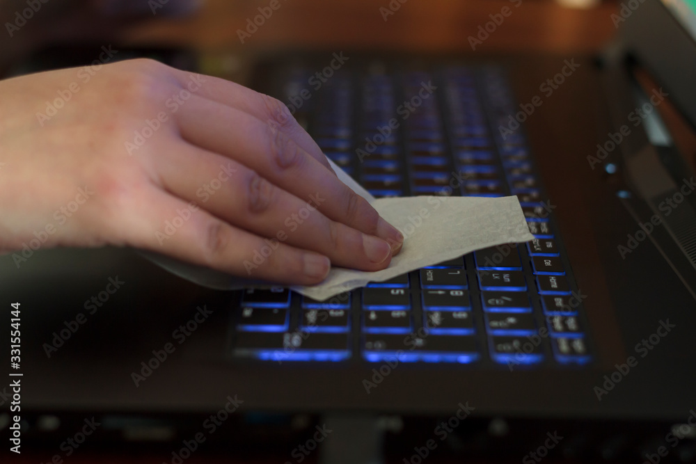 Clean and disinfect computer keyboard. Germs, bacteria, Covid-19 ...