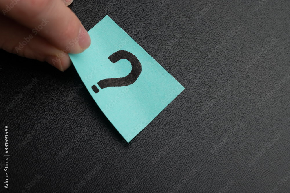 Sticker with a question mark on the board. The concept is not knowledge ...
