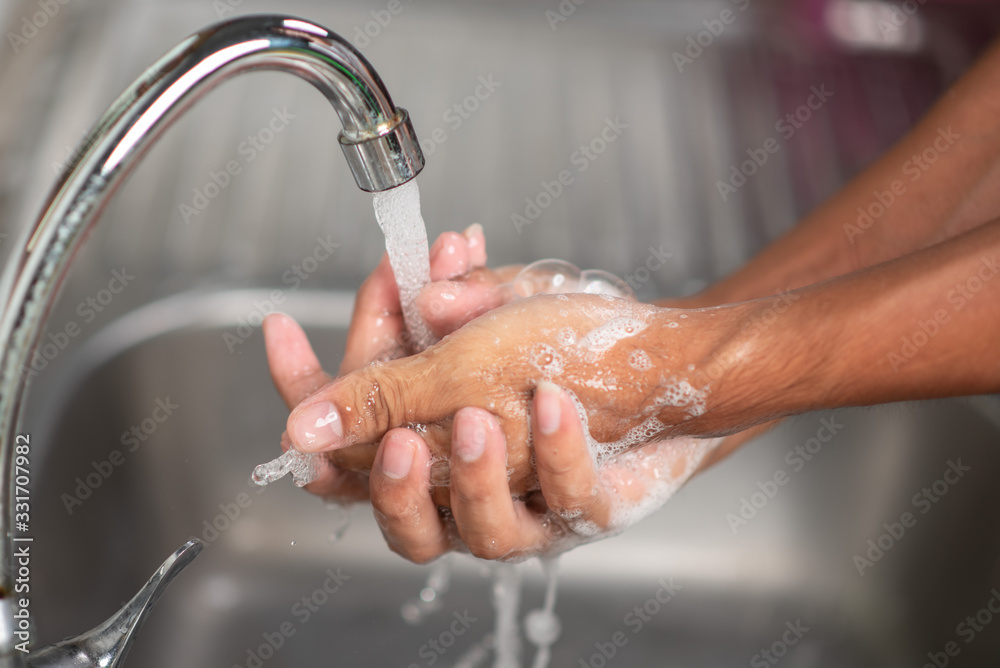 Men's hands are showing ways to wash their hands with a cleaning gel to ...