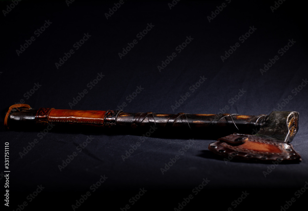 hand-forged axe on a black background. weapons of the Slavs. Stock ...